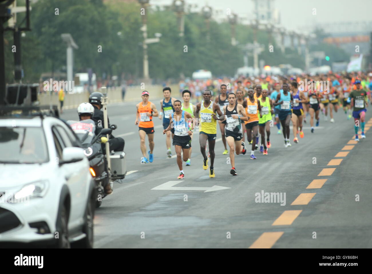 Beijing, Beijing, China. 17th Sep, 2016. Participants run at the ...