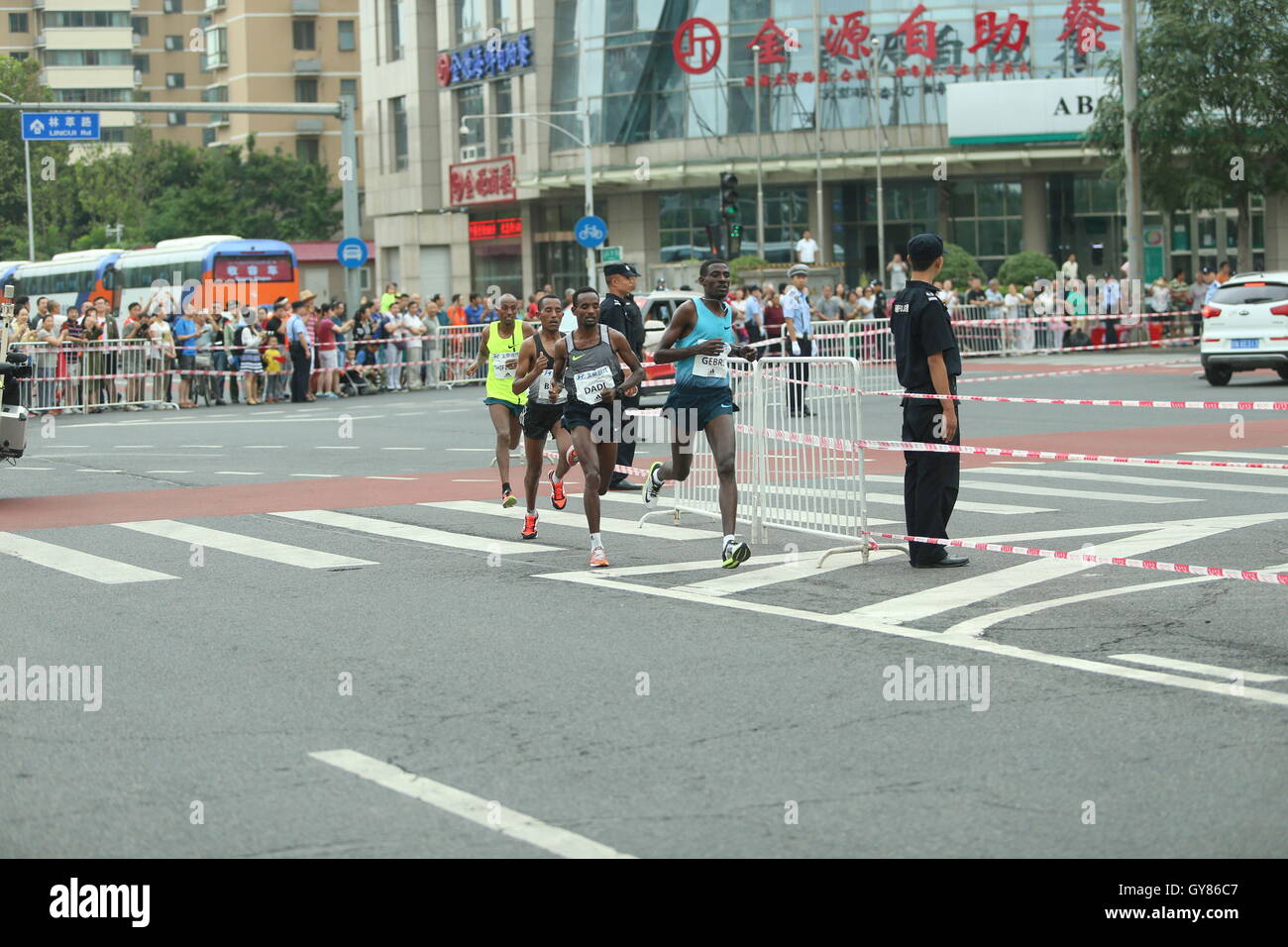 Beijing, Beijing, China. 17th Sep, 2016. Participants run at the ...