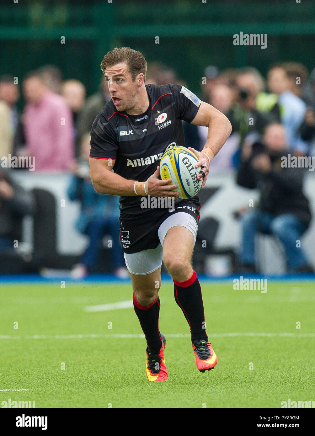 LONDON, ENGLAND - SEPTEMBER 17: Chris Wyles of Saracens runs with the ...