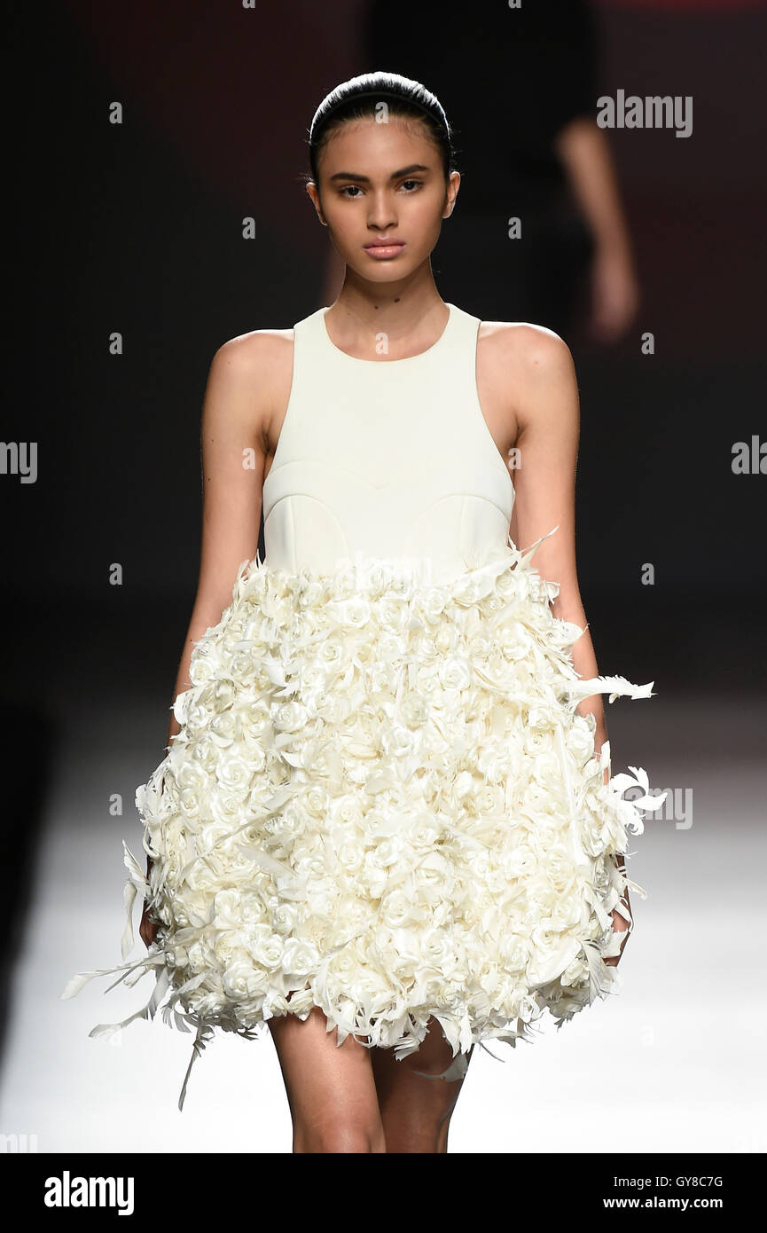 Madrid, Spain. 18th Sept, 2016. A model wears at collection runway a ...