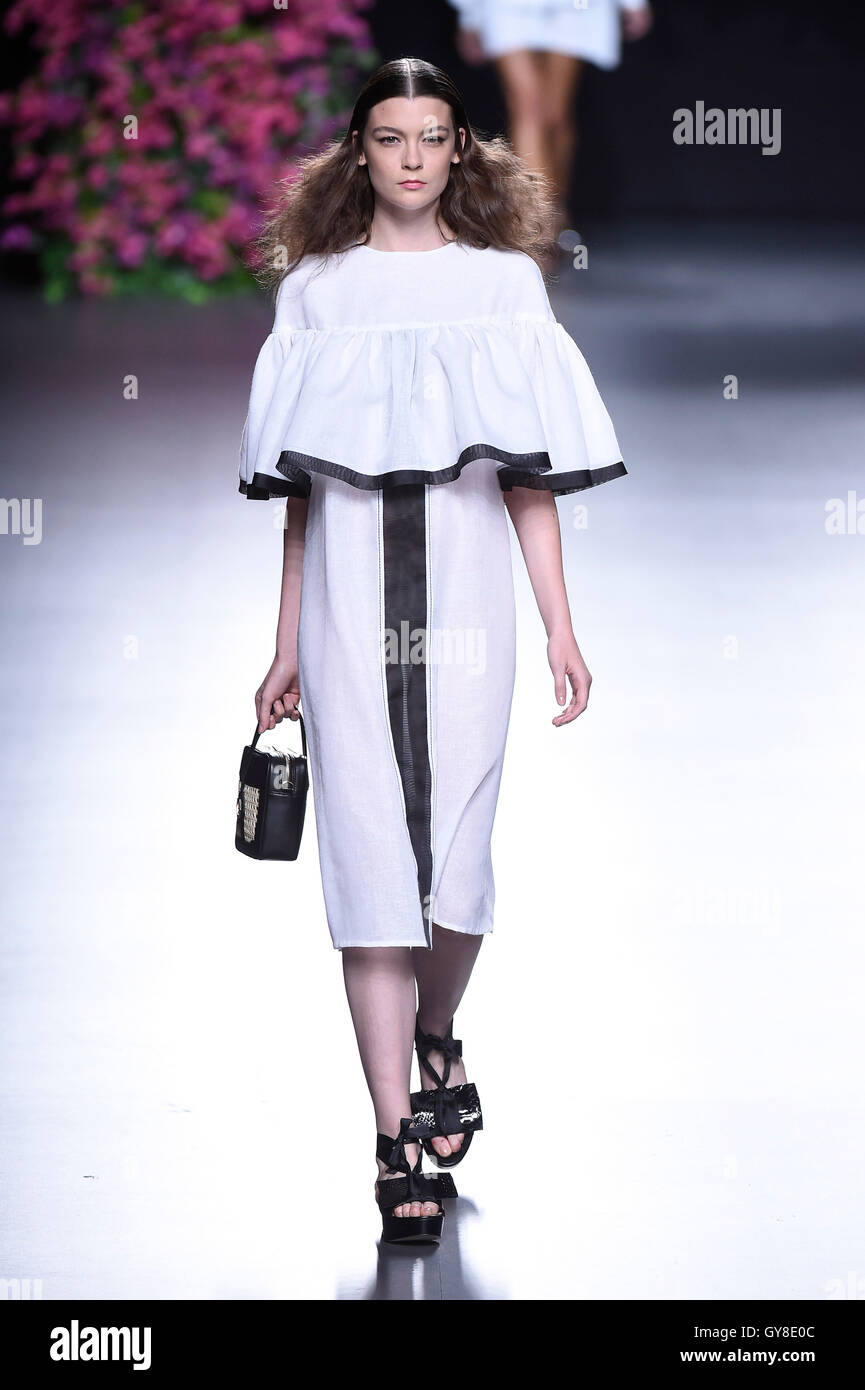 Madrid, Spain. 18th Sep, 2016. A model wears at collection runway a ...