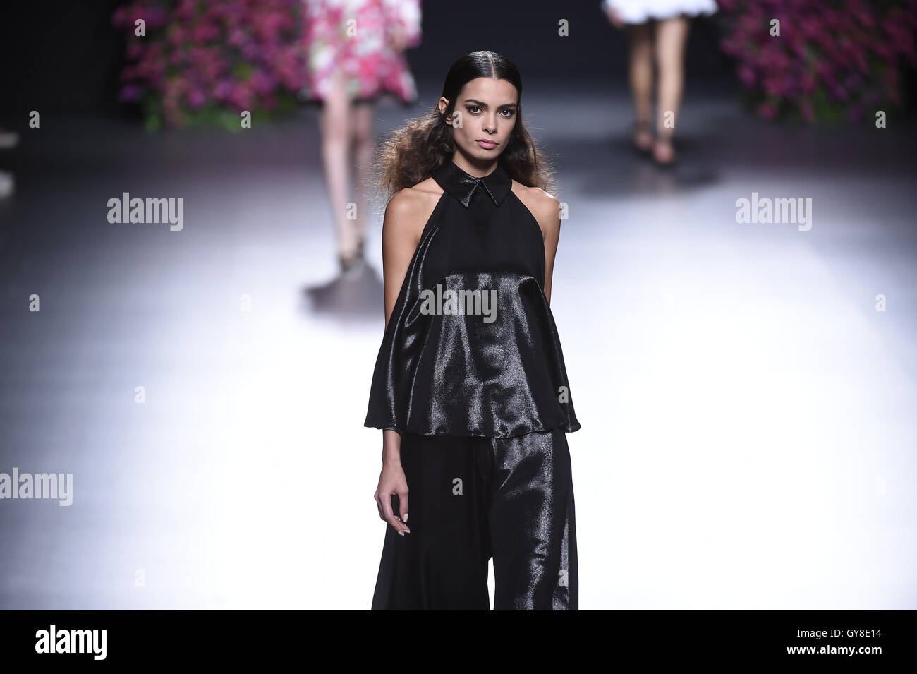 Madrid, Spain. 18th Sep, 2016. A model wears at collection runway a ...