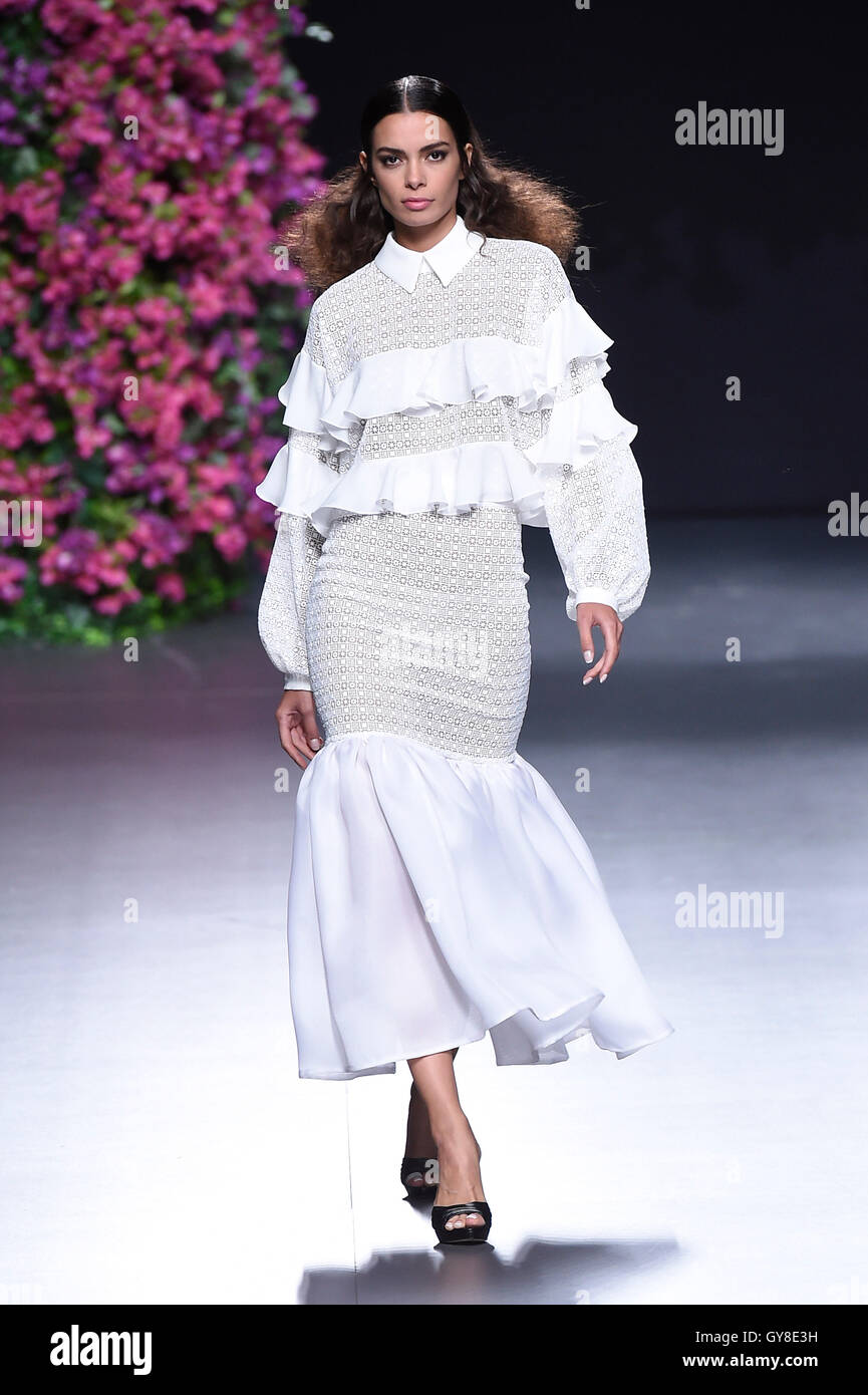 Madrid, Spain. 18th Sep, 2016. A model wears at collection runway a ...