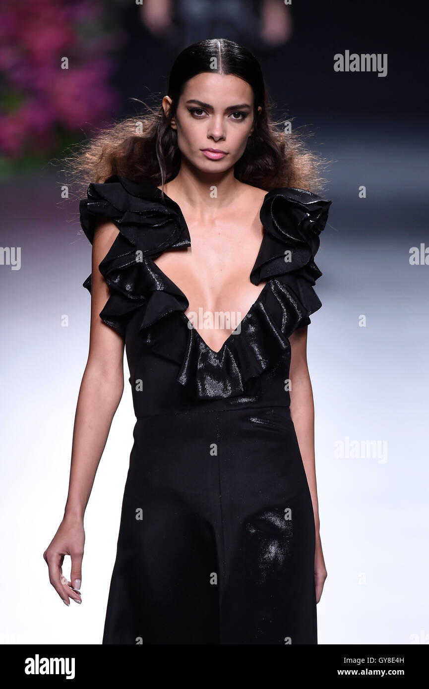 Madrid, Spain. 18th Sep, 2016. A model wears at collection runway a ...