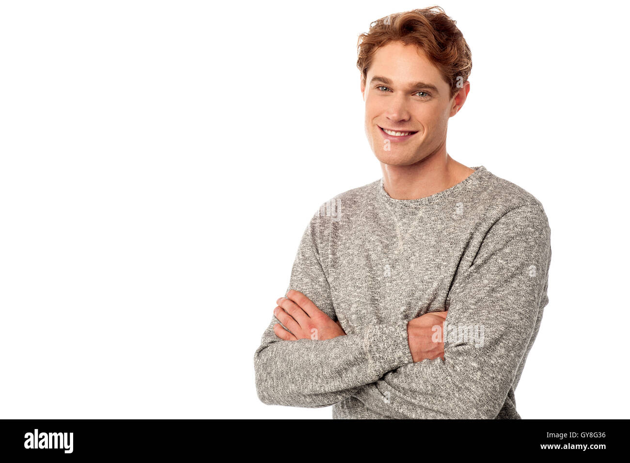 Isolated young man over white background Stock Photo - Alamy