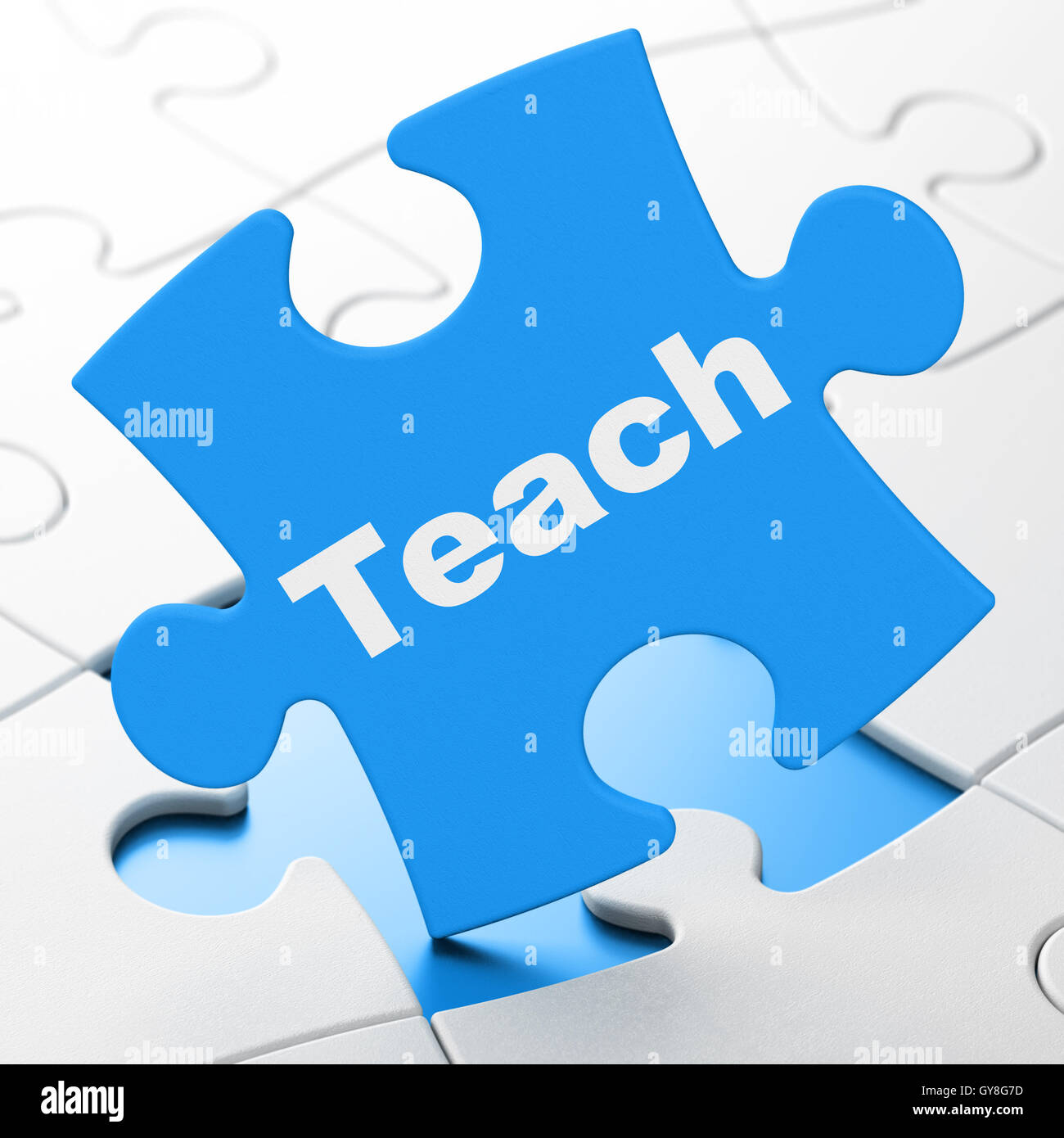 Education concept: Teach on puzzle background Stock Photo - Alamy
