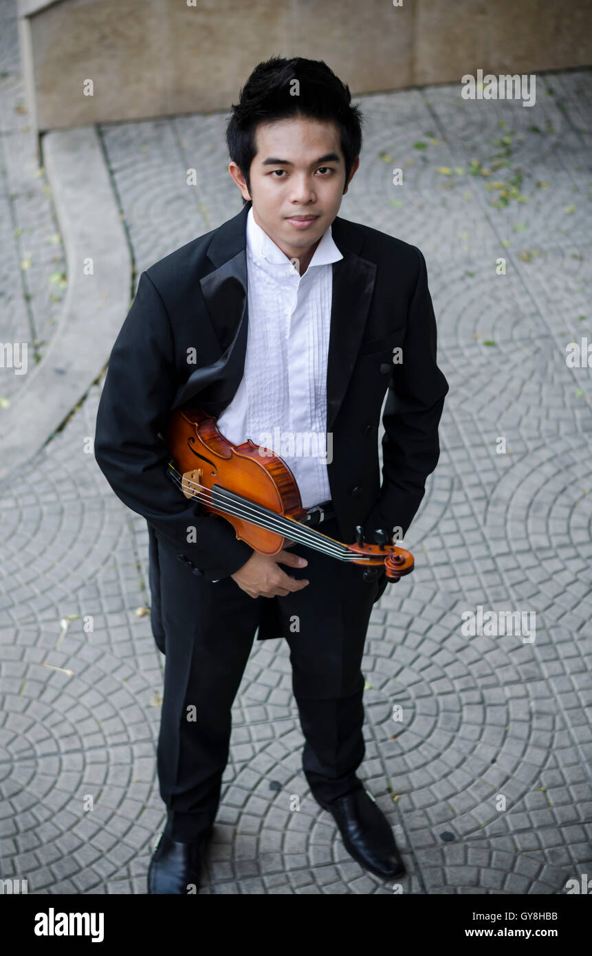 asia man with his violin Stock Photo - Alamy