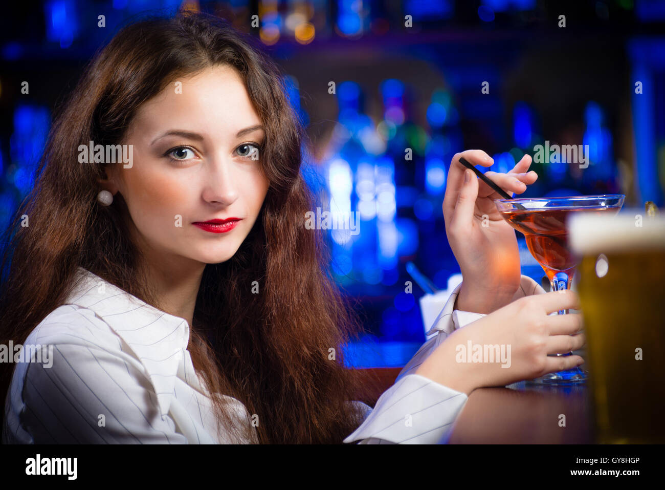 young woman in a bar Stock Photo - Alamy