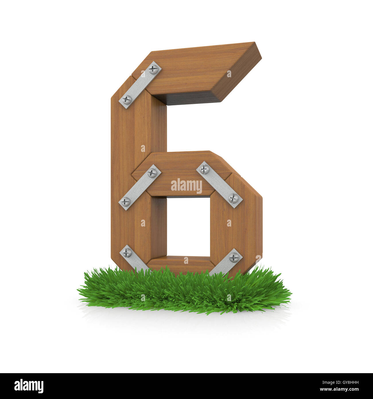 Wooden number six in the grass Stock Photo - Alamy
