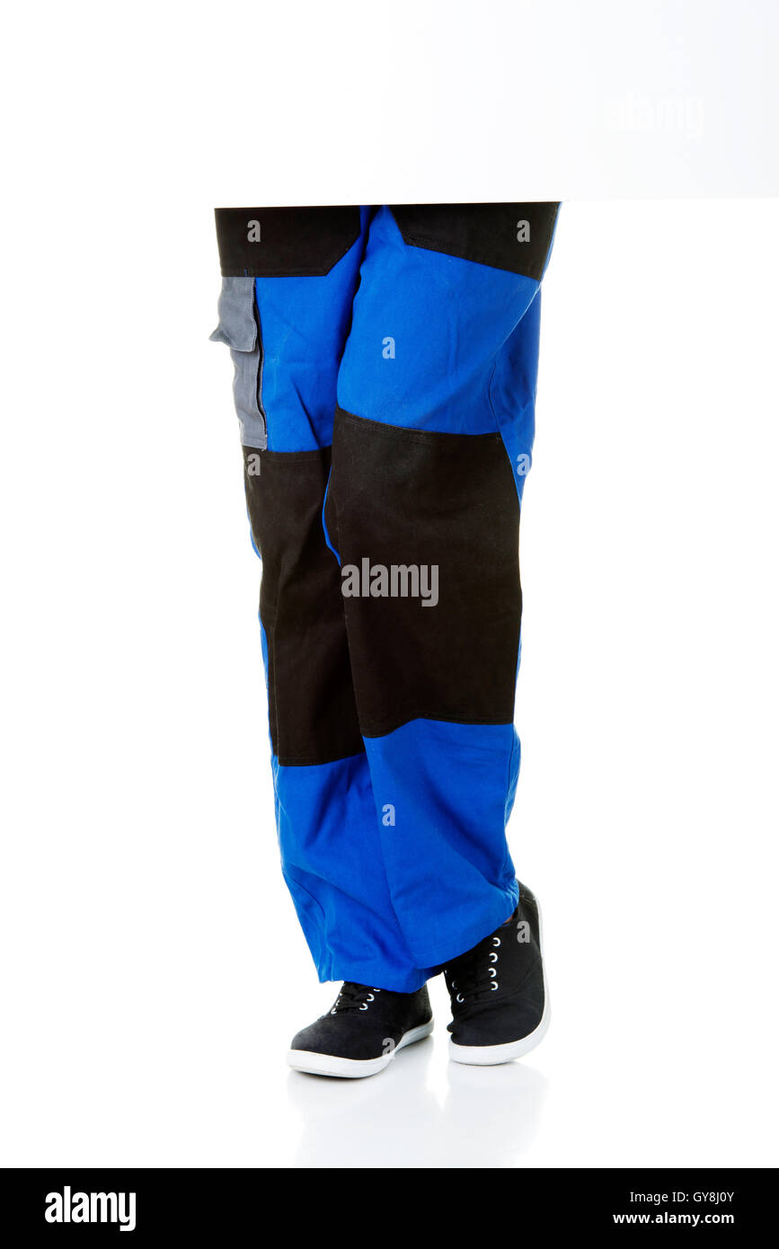 Female legs. Work clothes. Vertical Stock Photo - Alamy