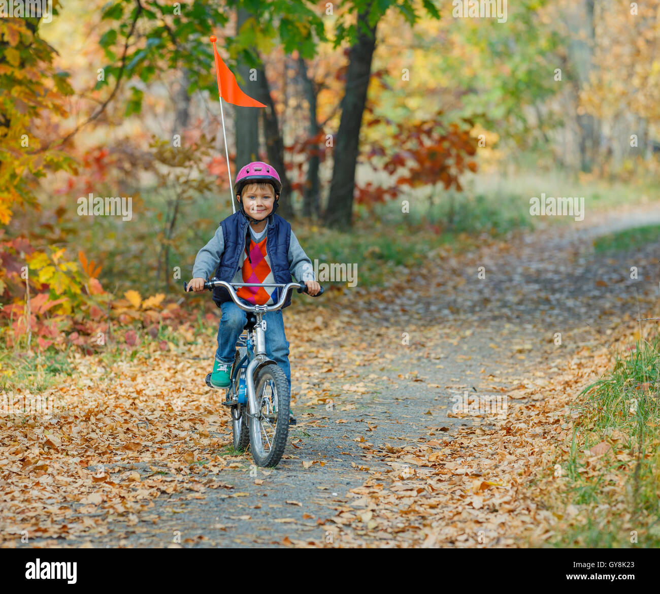 Little boy on bicycle Stock Photo - Alamy
