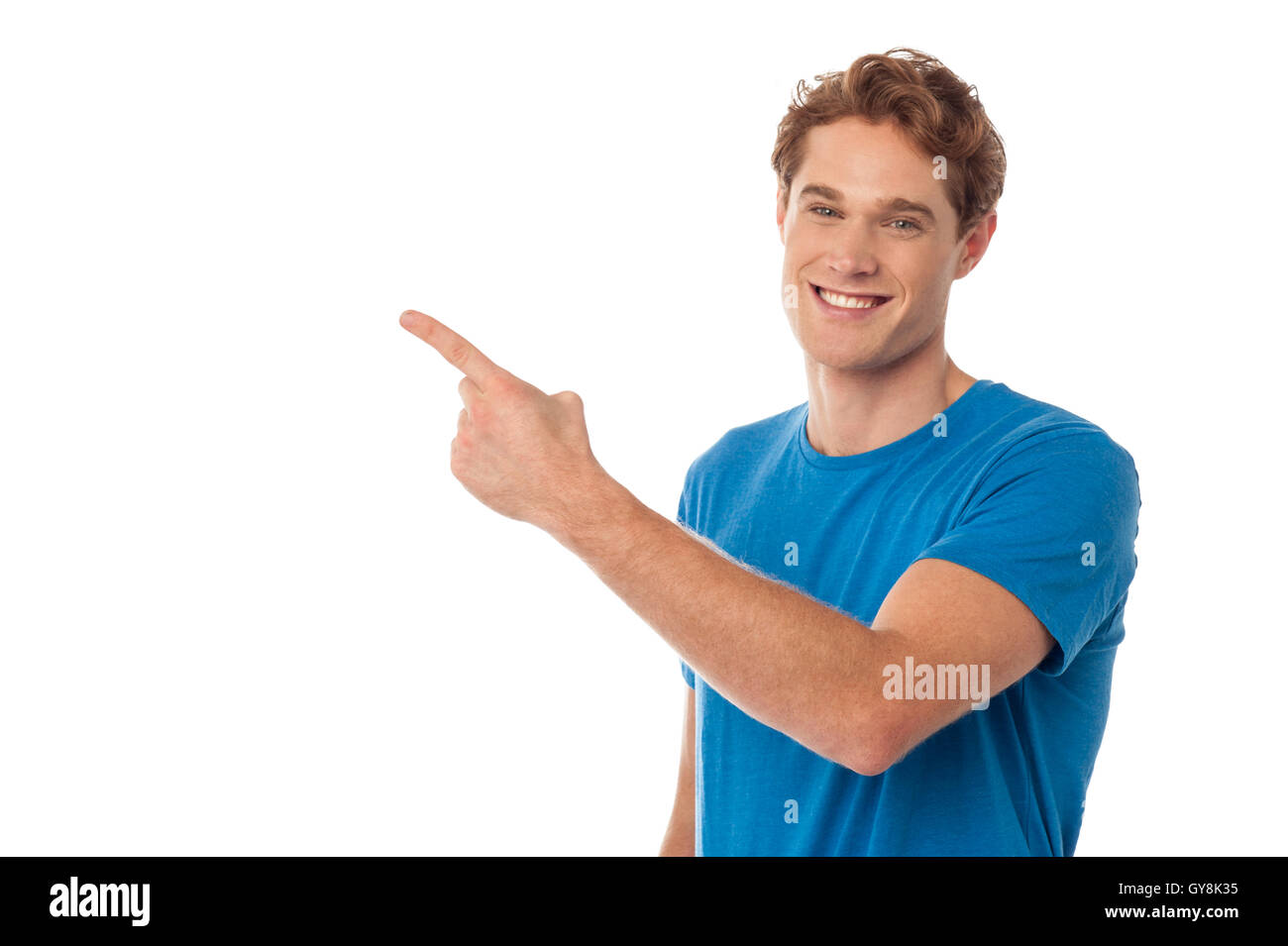 Happy man pointing away Cut Out Stock Images & Pictures - Alamy