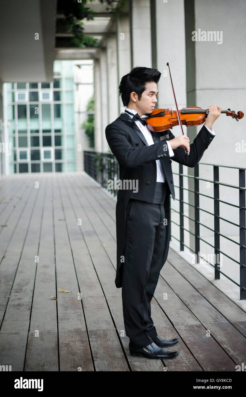 asia man with his violin Stock Photo - Alamy
