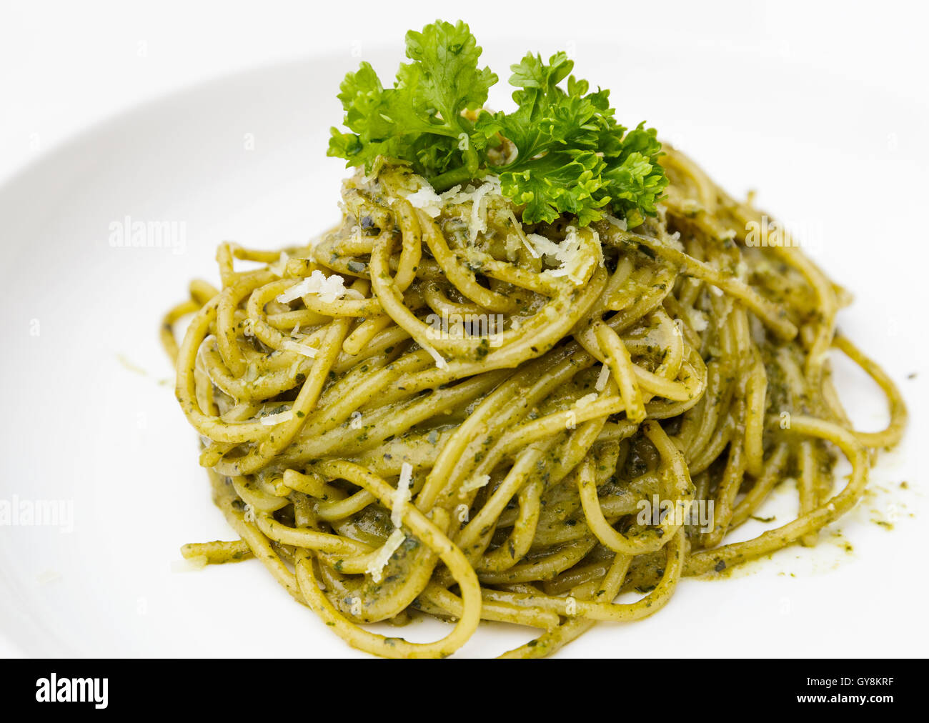 Italian pasta spaghetti with pesto sauce and basil leaf Stock Photo - Alamy