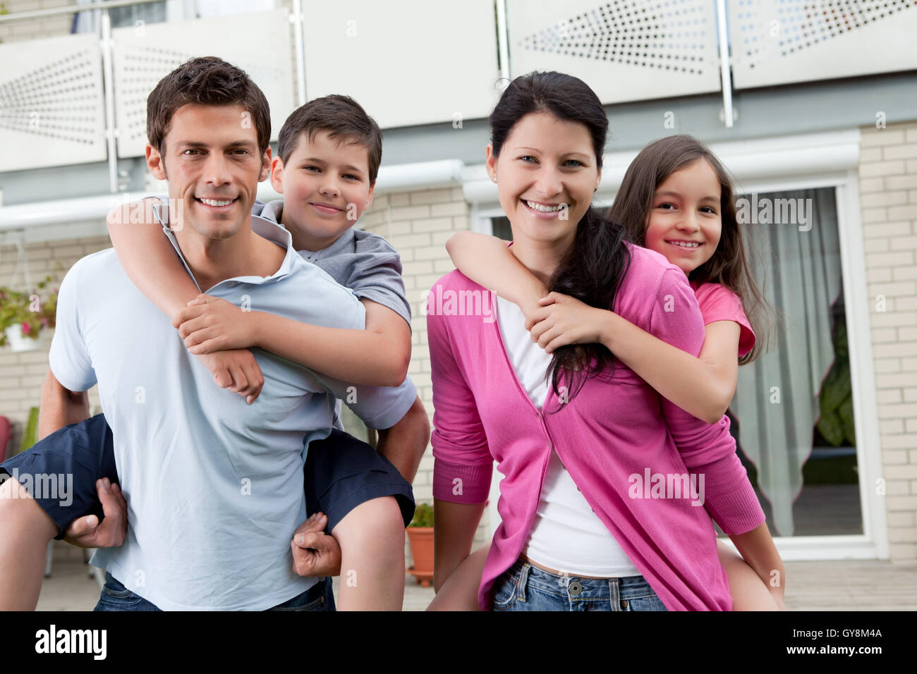 Beautiful young family together Stock Photo - Alamy