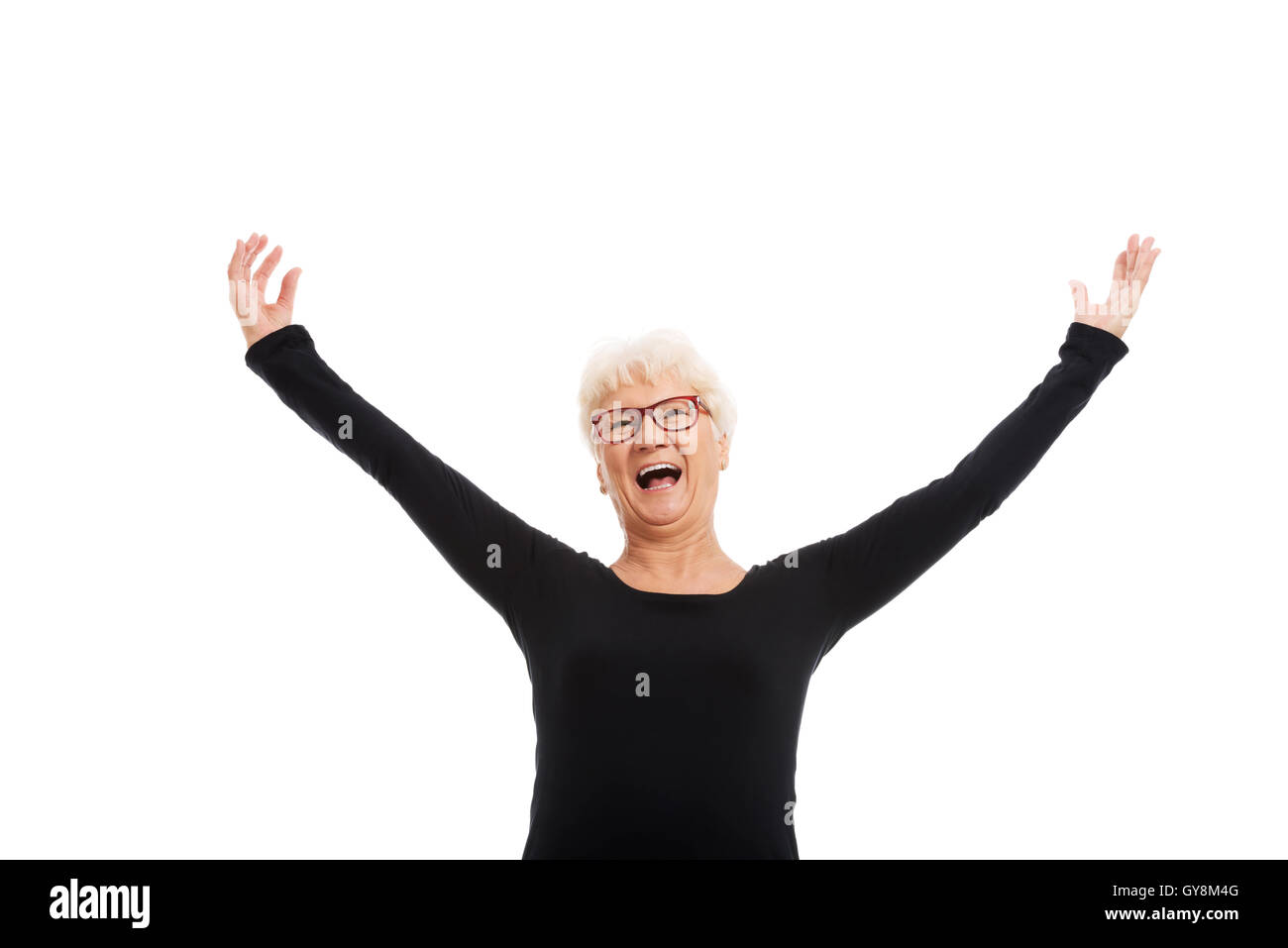 Happy old lady with raised hands Stock Photo - Alamy