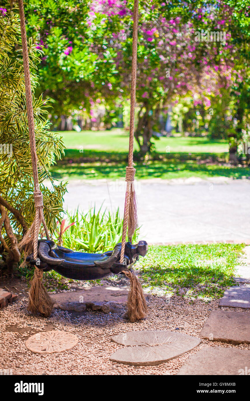 Close-up of a beautiful swing in the garden Stock Photo - Alamy
