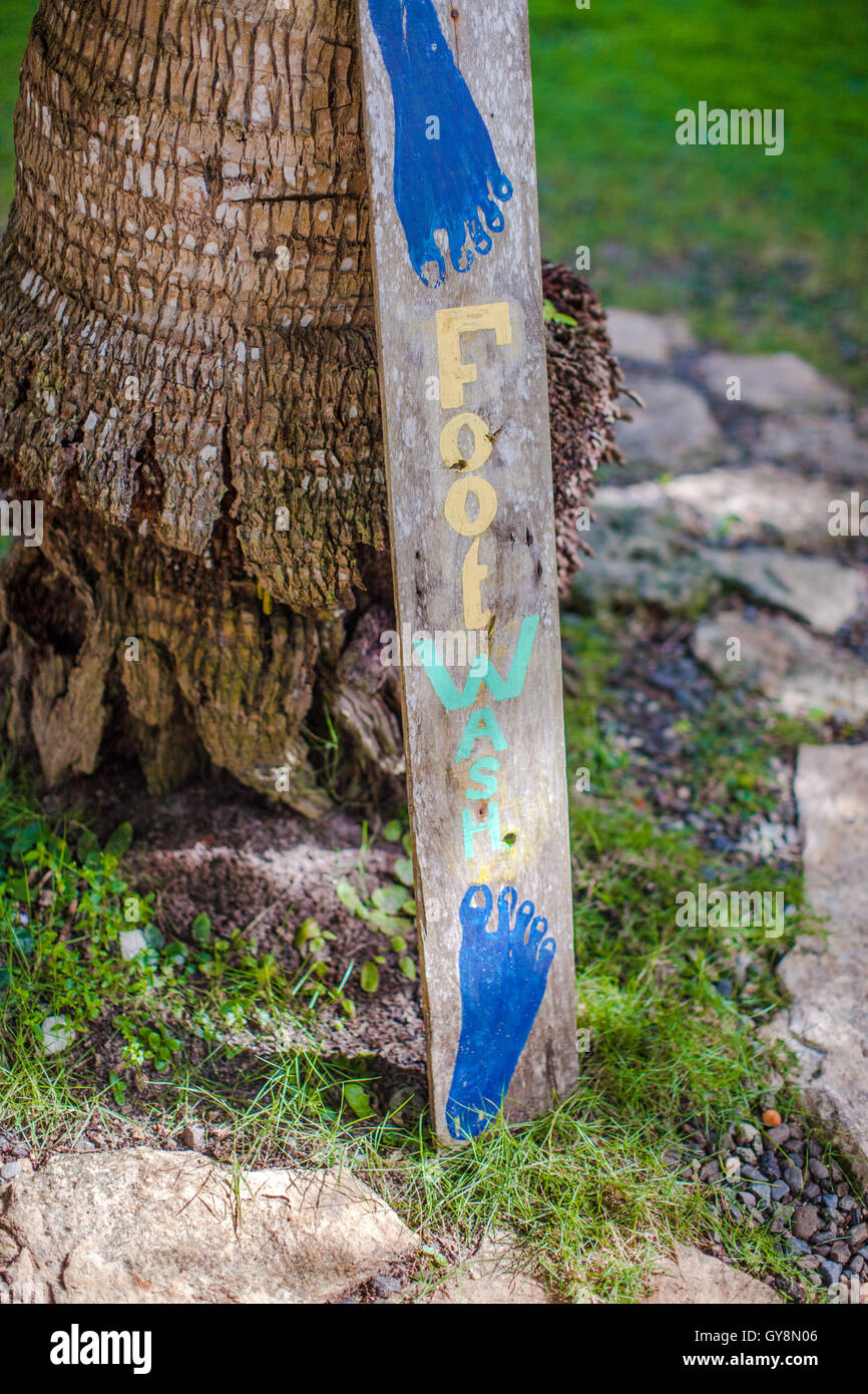 Sign saying Foot Wash on the lawn boutique hotel Stock Photo - Alamy