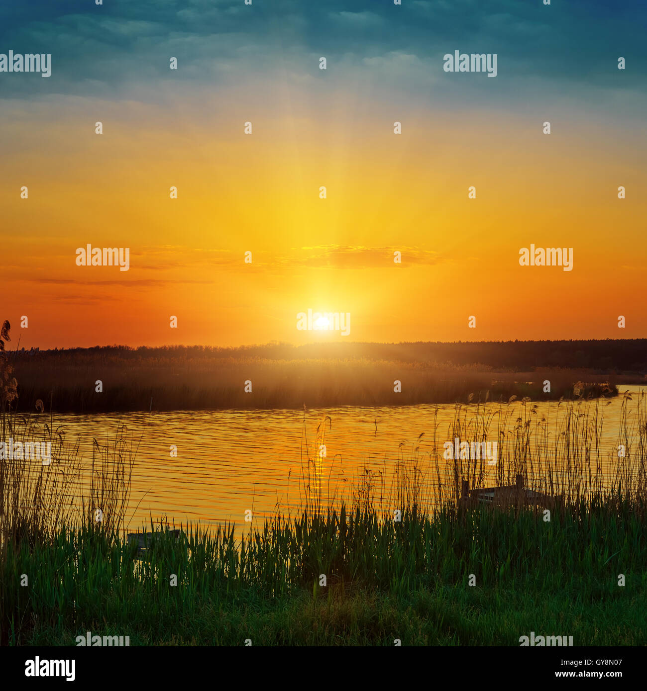 orange sunset over river Stock Photo - Alamy