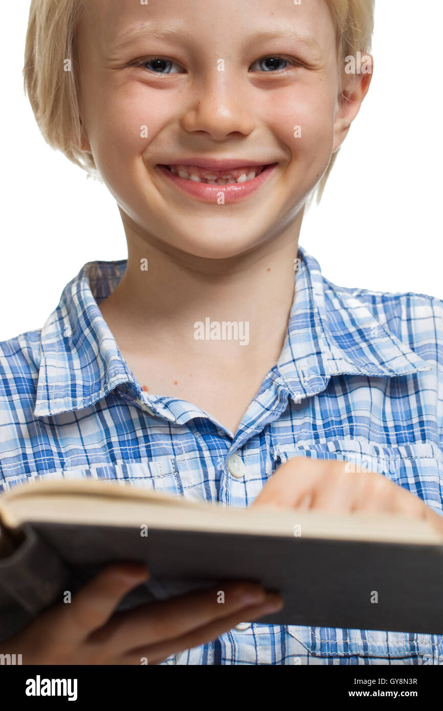 Happy boy reading book Stock Photo - Alamy