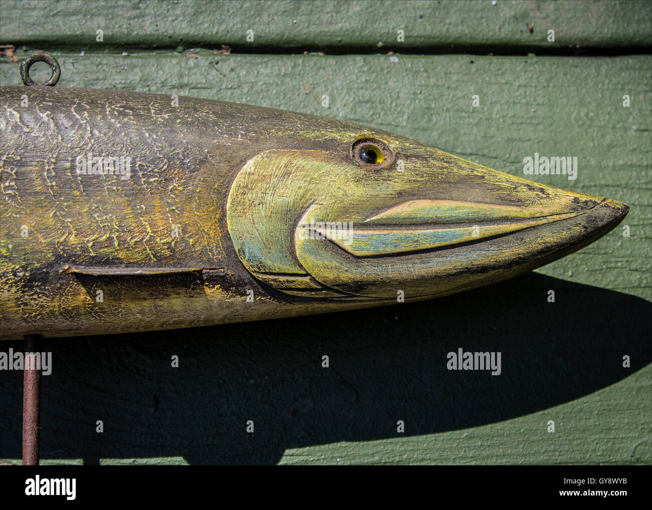 Carved wooden fish Stock Photo - Alamy