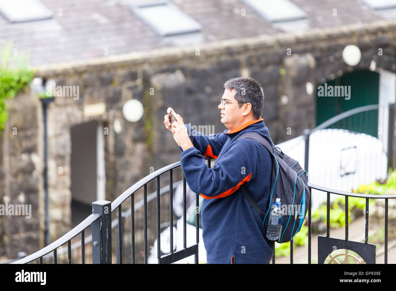 Man taking mobile phone photos Stock Photo - Alamy