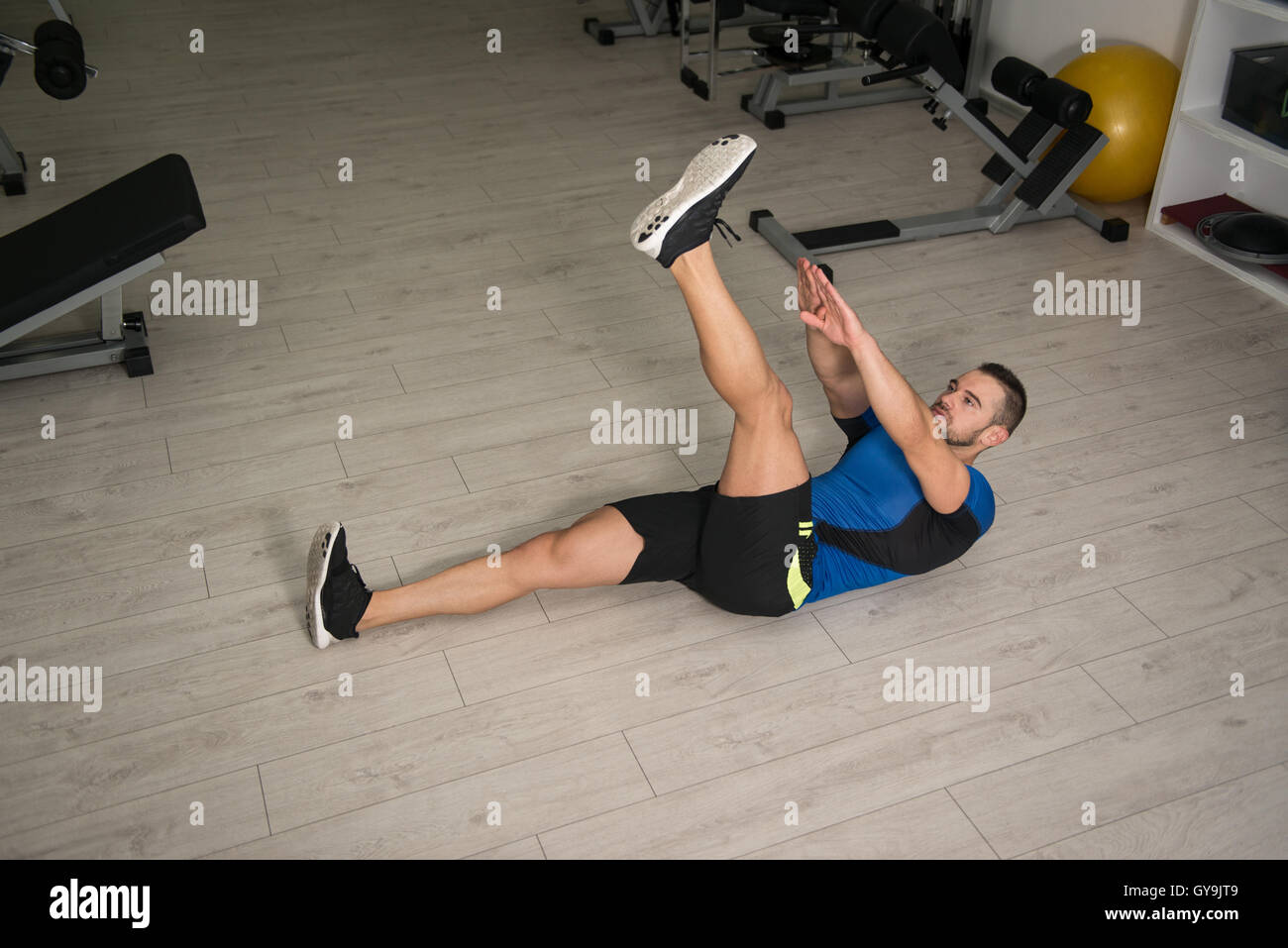 Man performing abdominal exercises hi-res stock photography and images ...