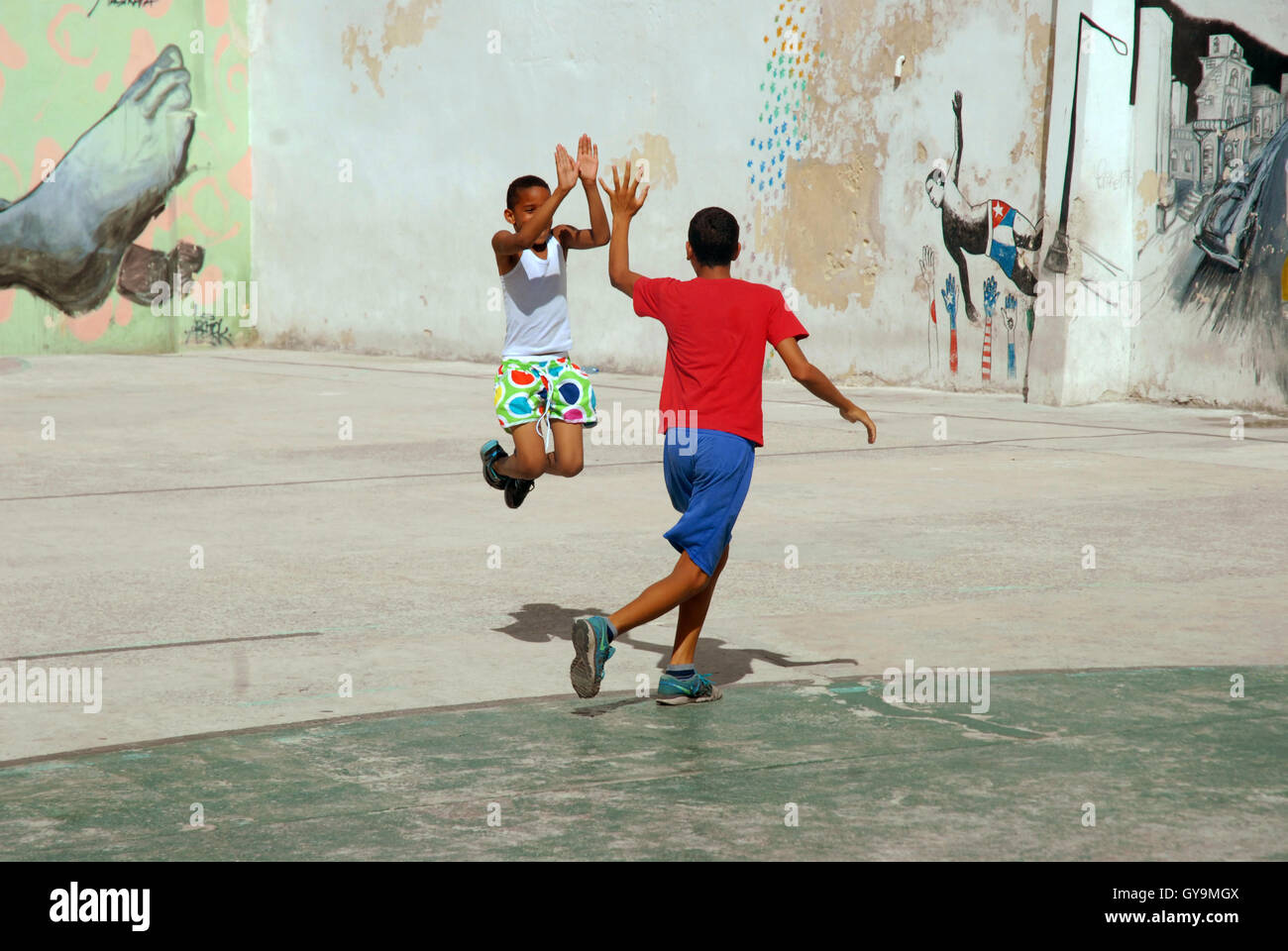 Boys High Five, Havana, Cuba Stock Photo - Alamy