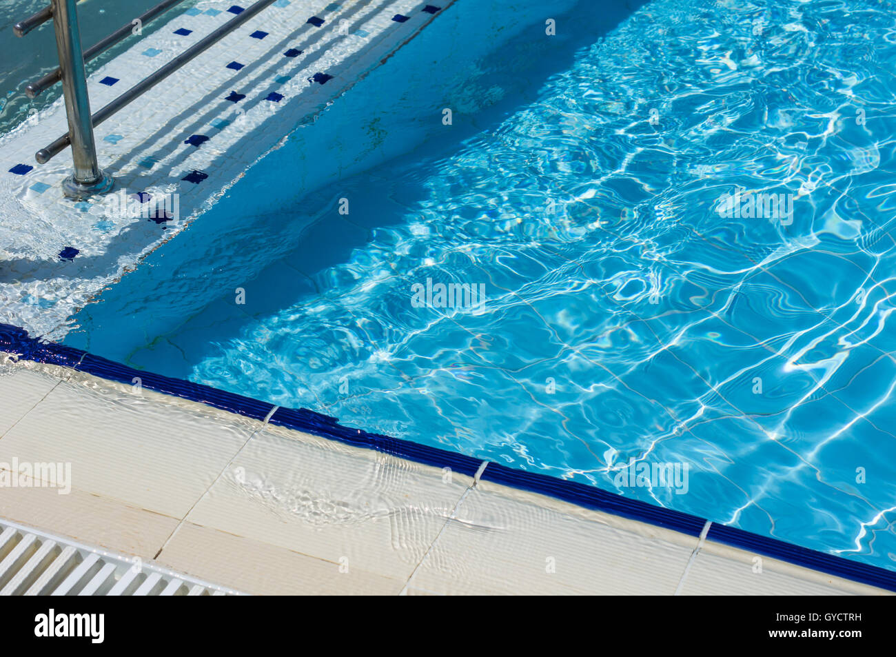 Blue swimming pool rippled water detail Stock Photo - Alamy