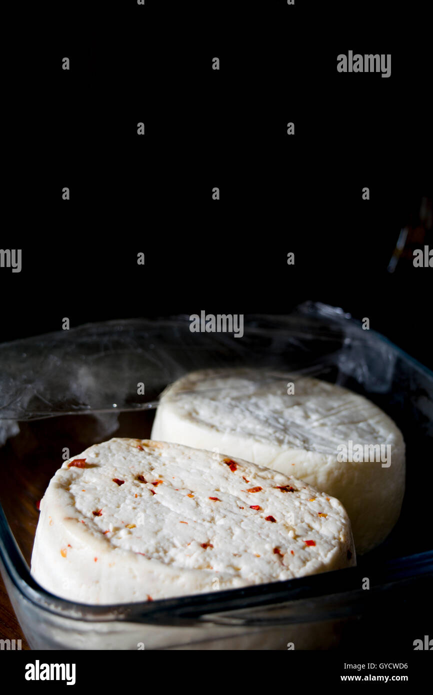 primo sale cheese flavored with crushed pepper Stock Photo - Alamy