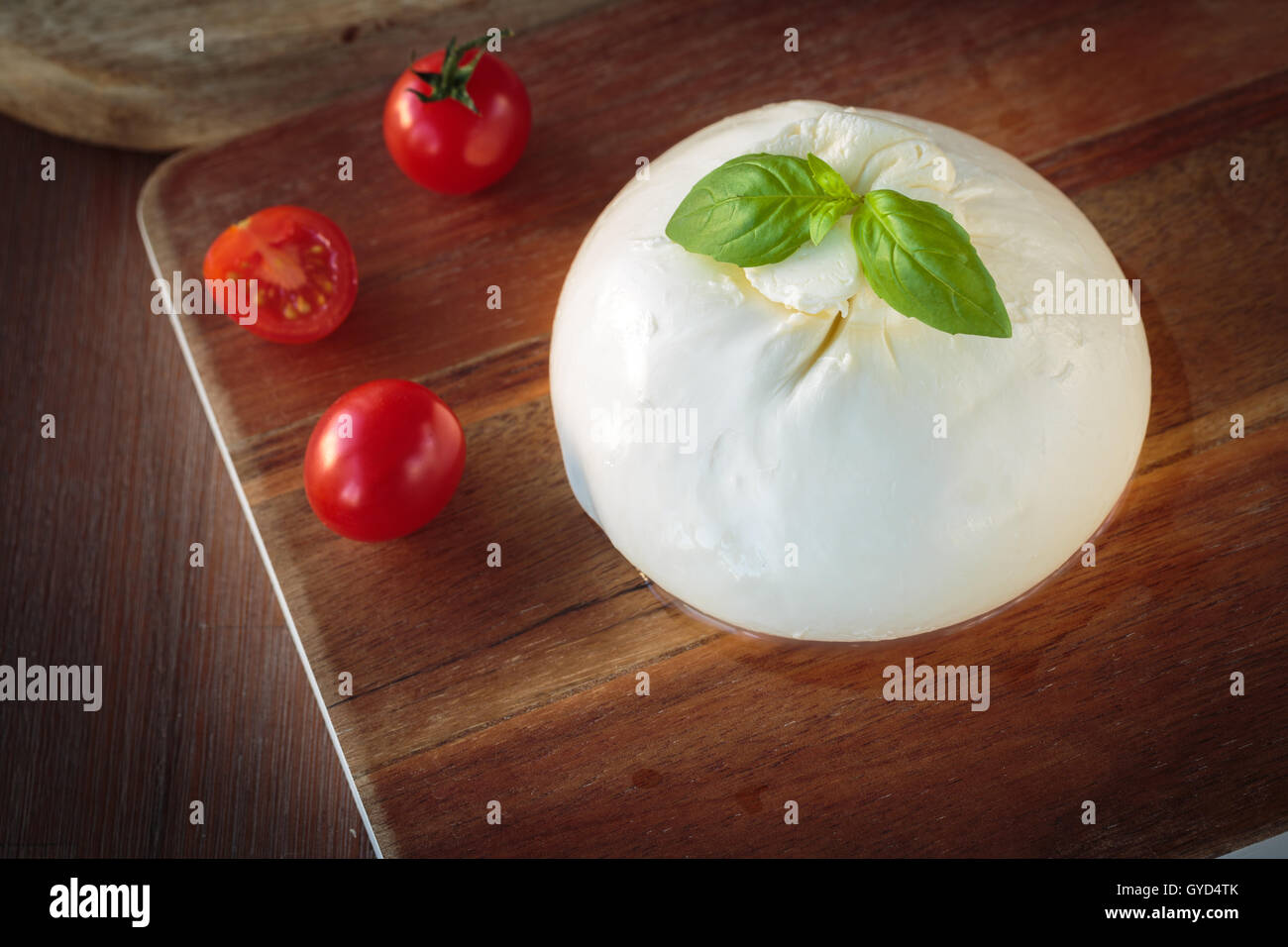 Delicious italian Burrata mozzarella cheese made with fresh milk Stock ...