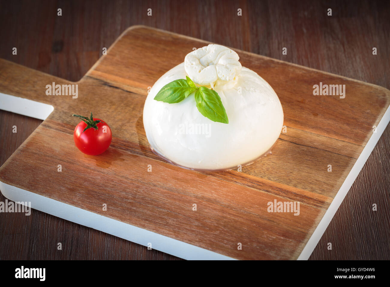 Delicious italian Burrata mozzarella cheese made with fresh milk Stock ...