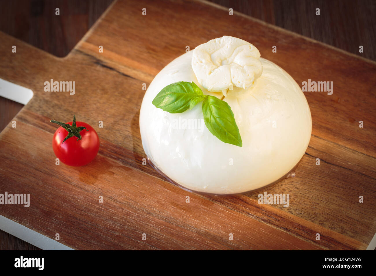 Delicious italian Burrata mozzarella cheese made with fresh milk Stock ...
