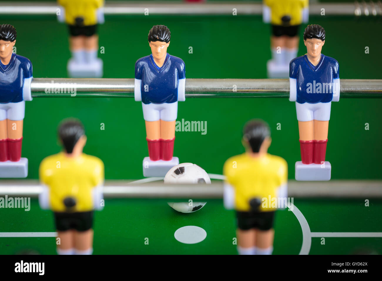 Football players miniatures from the kicker table game Stock Photo - Alamy