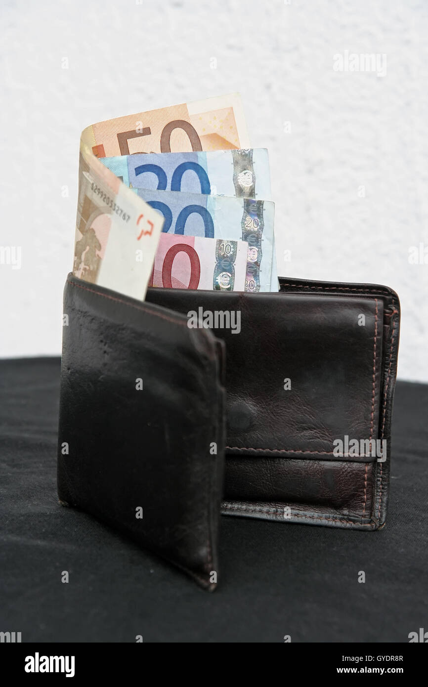 Brown leather wallet. Wallet with Euro paper bank notes Stock Photo - Alamy