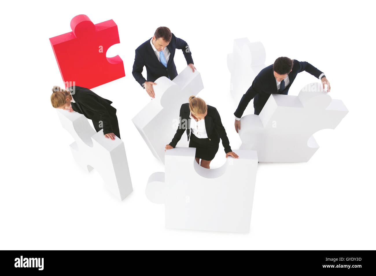 Business people team assembling puzzle isolated on white background ...