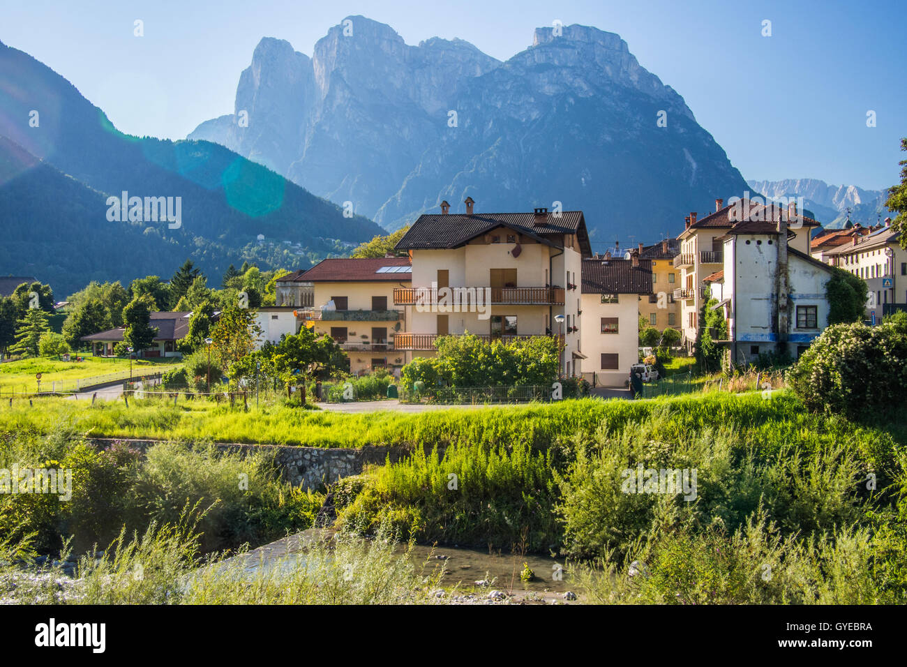 Agordo town set in the Dolomite alps, Belluno province, Veneto region ...