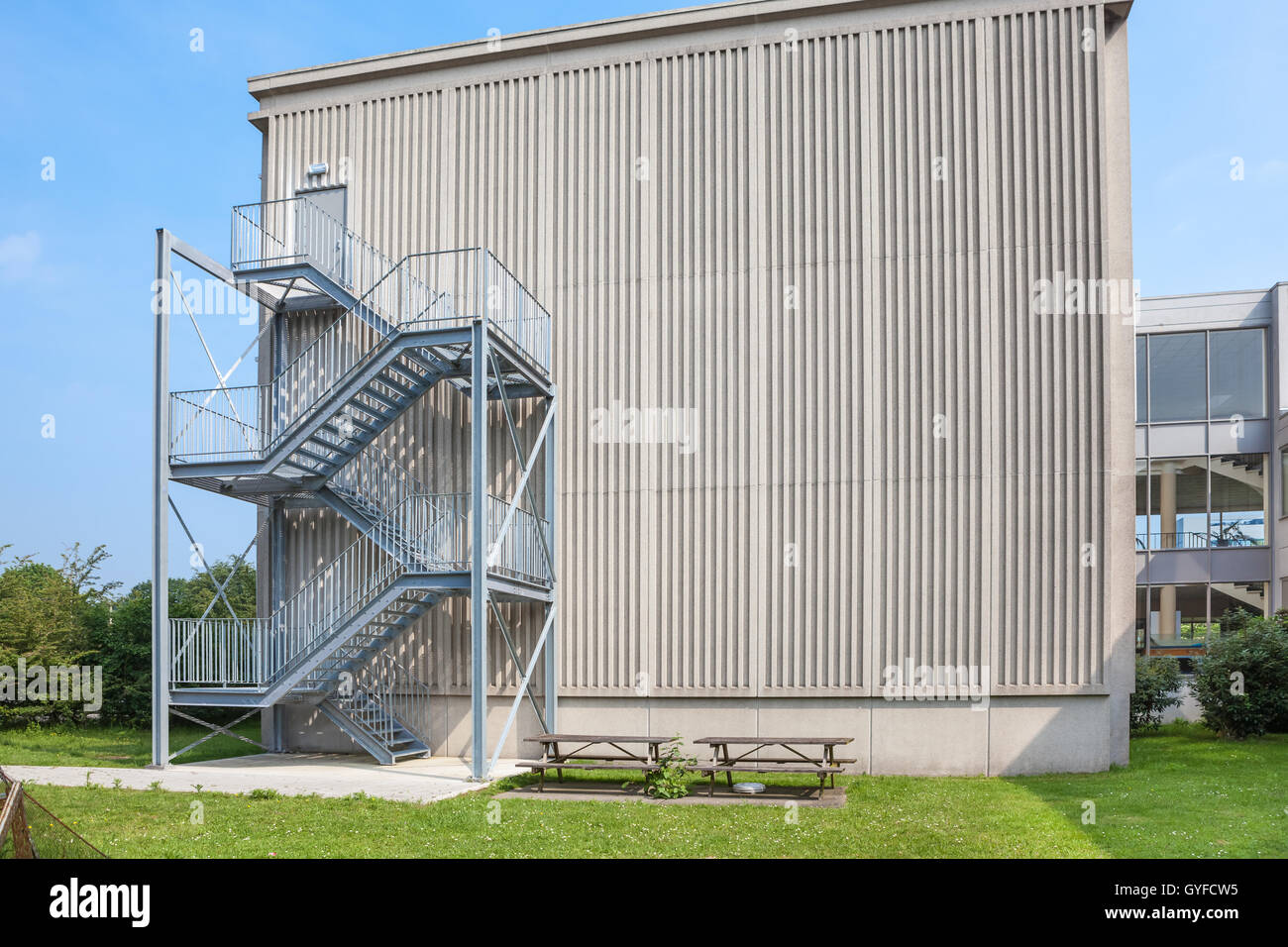 an tall building there is an emergency staircase Stock Photo - Alamy