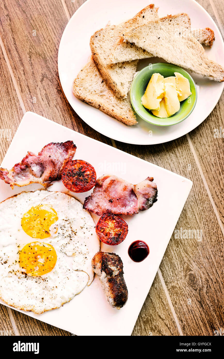 traditional classic english british fried breakfast with eggs bacon ...
