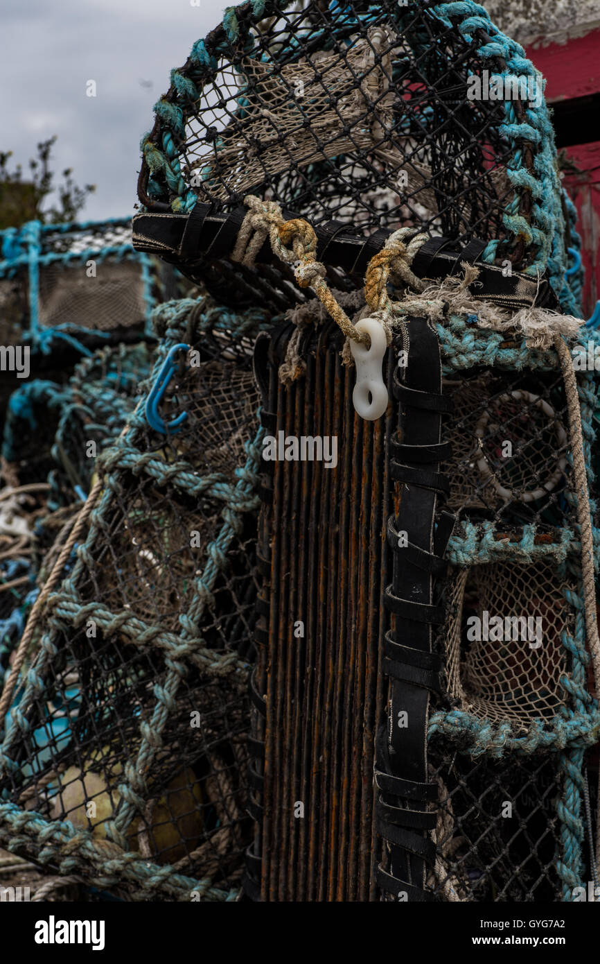 Stack of lobster nets at Dunure Harbour Stock Photo - Alamy