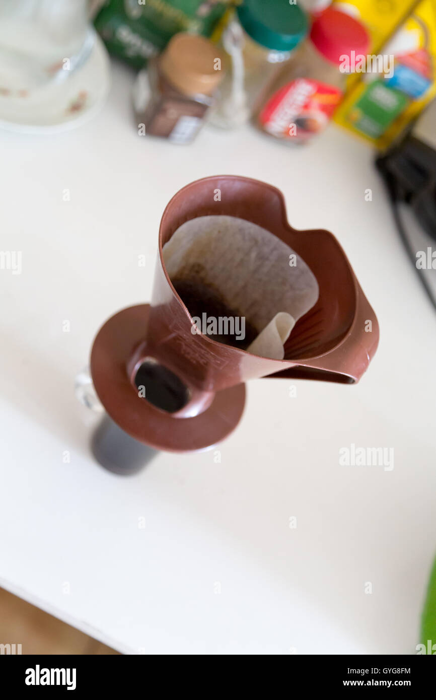 Coffee in the filter paper cone Stock Photo - Alamy