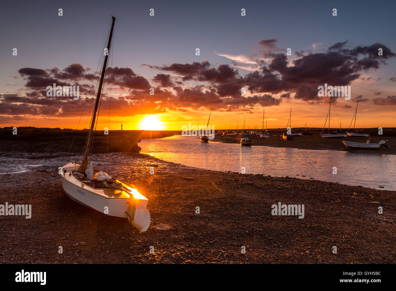 Beautiful sunset at Brancaster harbour, Norfolk, UK Stock Photo - Alamy
