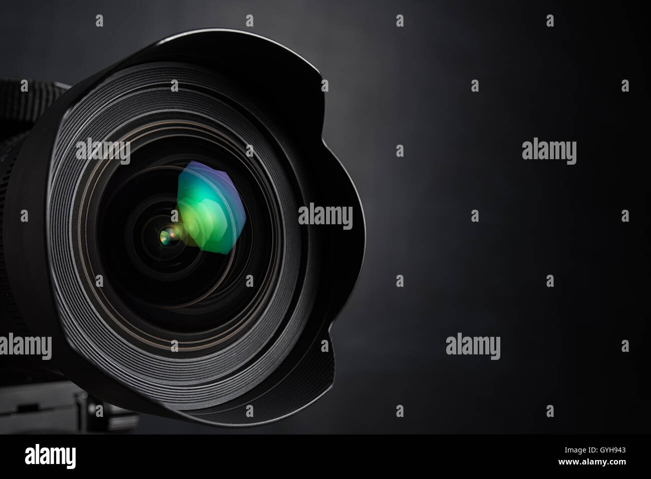 digital photo camera lens on black background Stock Photo - Alamy