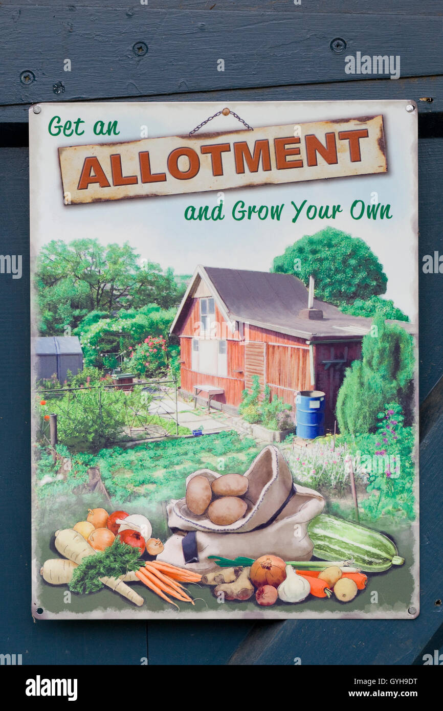 Vintage Metal Sign attached to wooden fence "Get an Allotments and grow ...