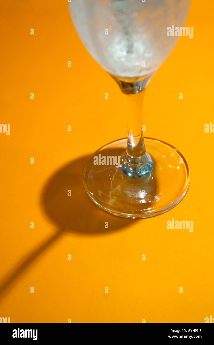 Glass and its shadow Stock Photo - Alamy
