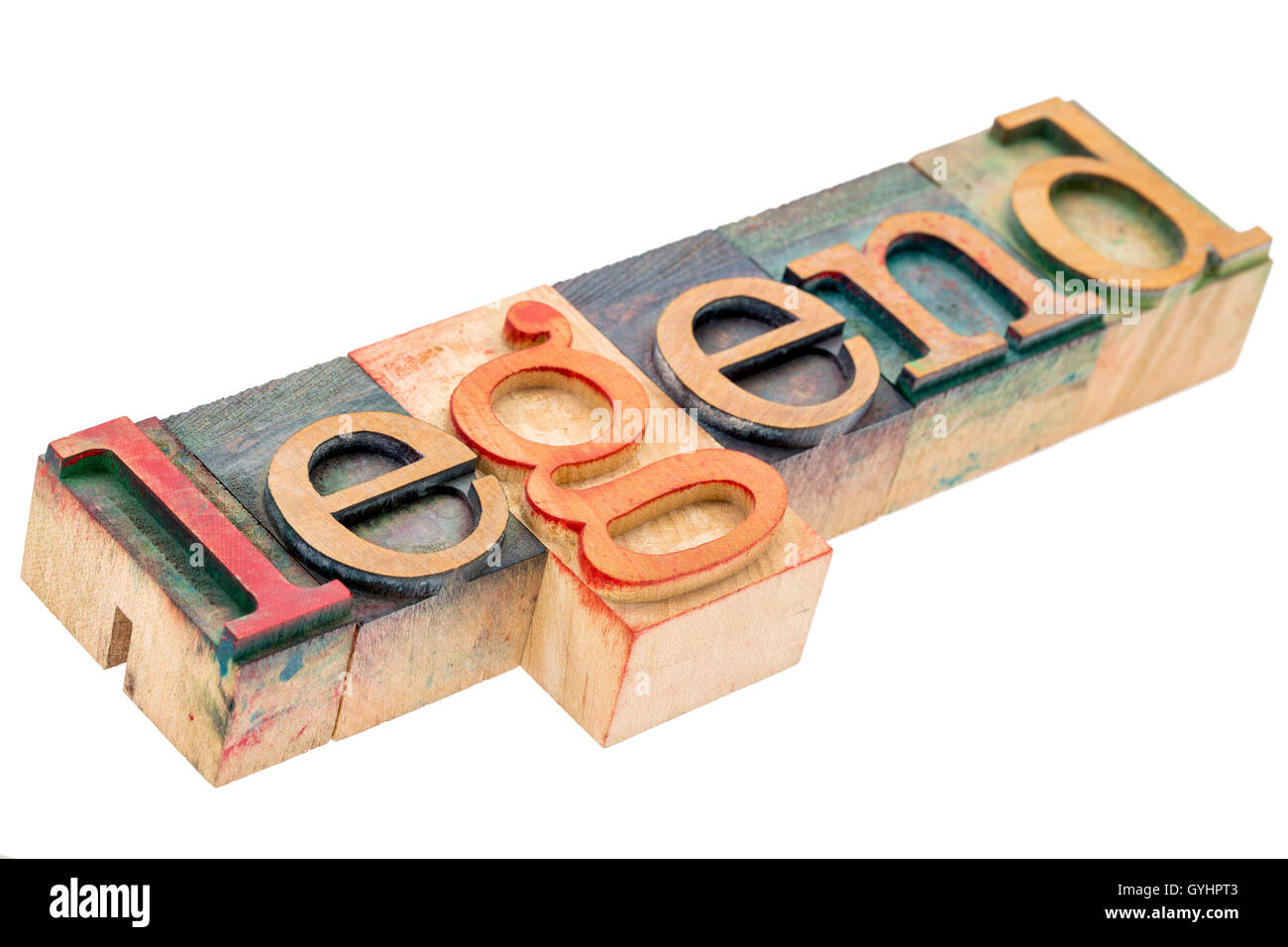 legend word - isolated text in letterpress wood type stained by color ...