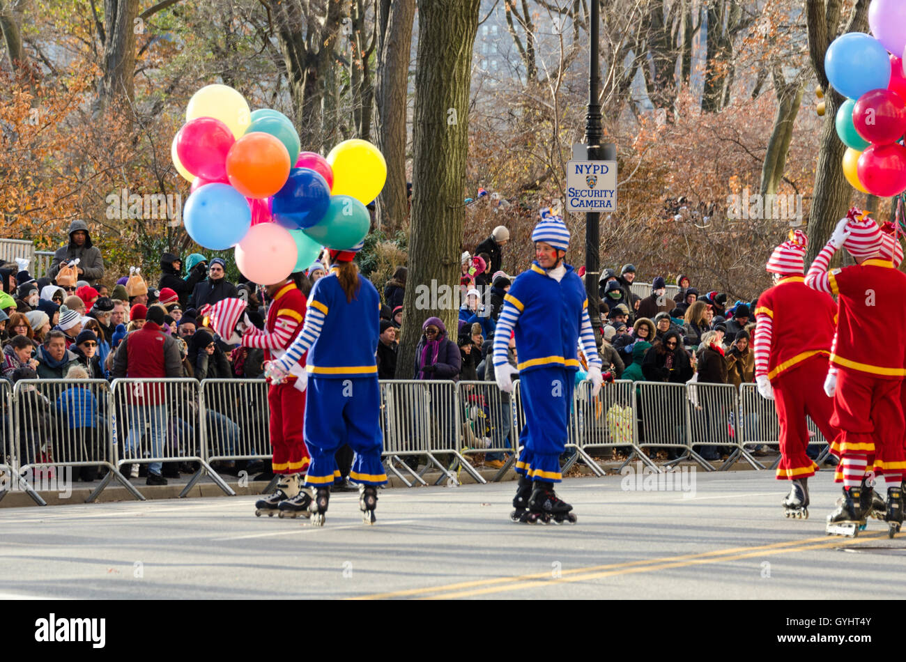 Rollerblading clowns entertain the waiting spectators before the Macy's ...