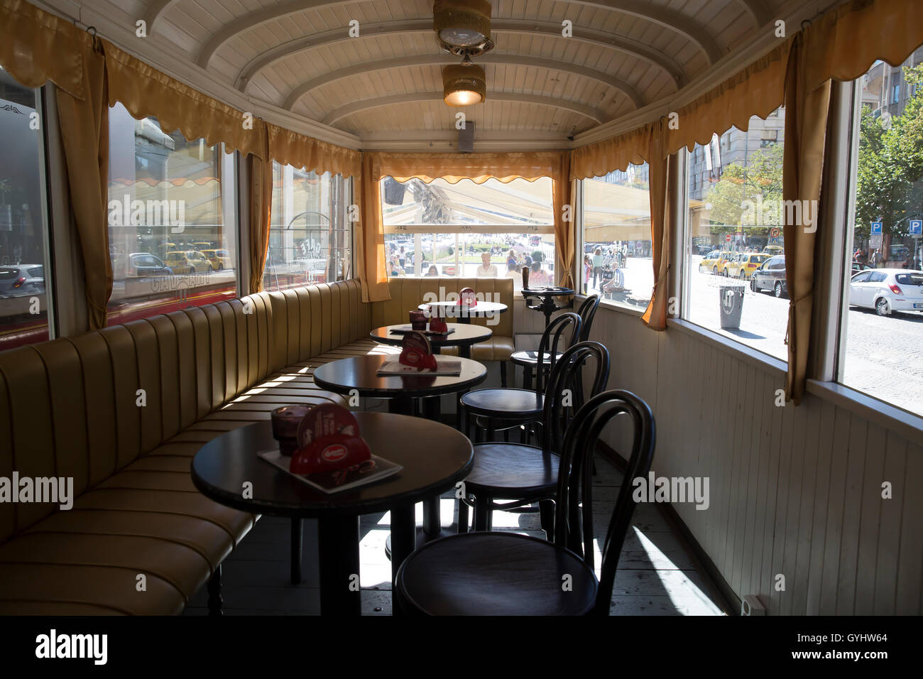The interior of an old tram which has been converted to a coffee shop ...