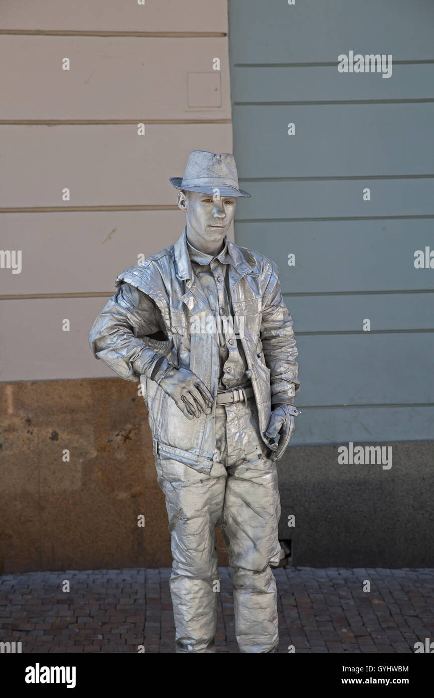 Life statues painted in silver in a street in Prague Stock Photo - Alamy