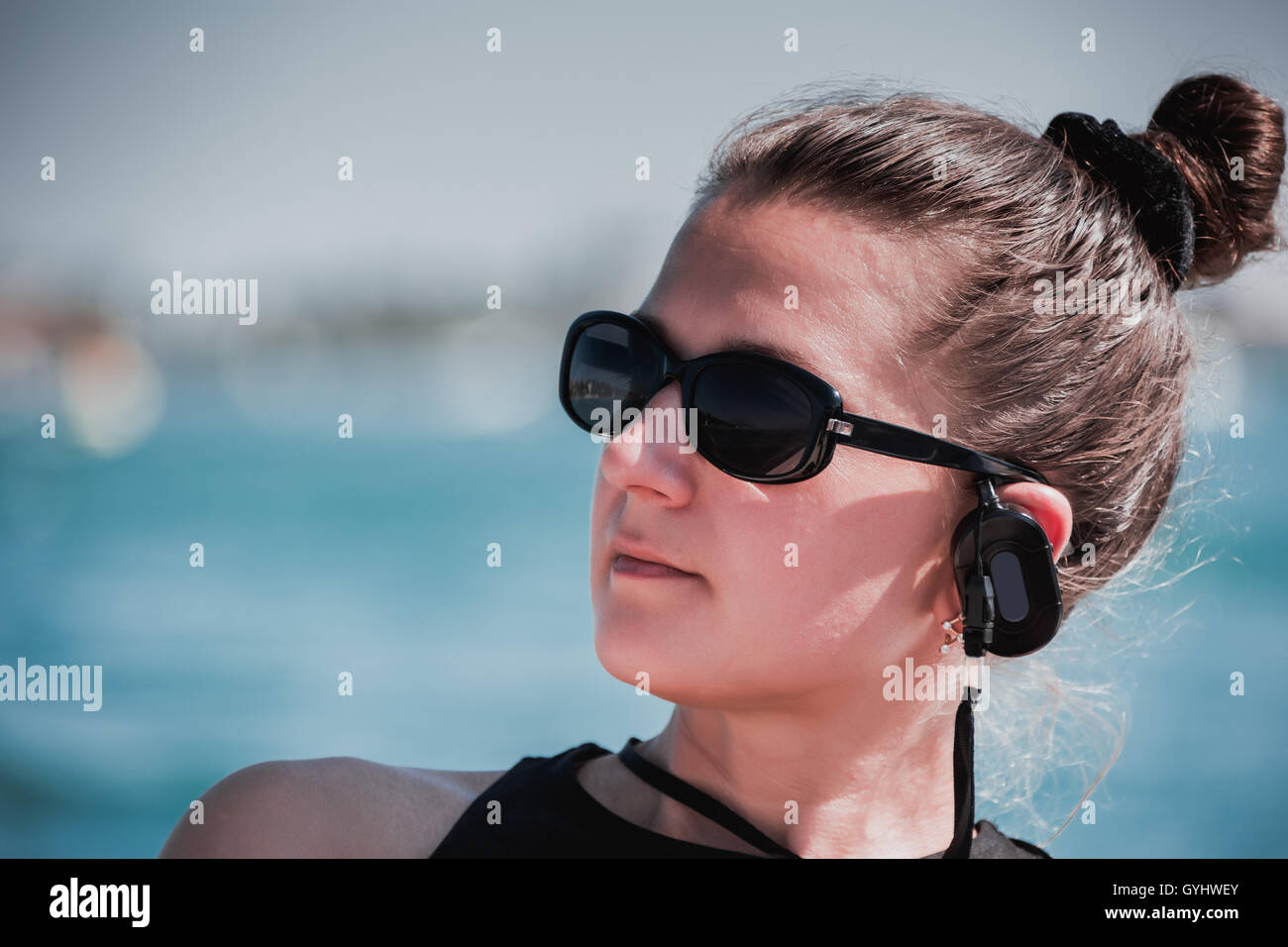 portrait of a woman on the sea background Stock Photo - Alamy